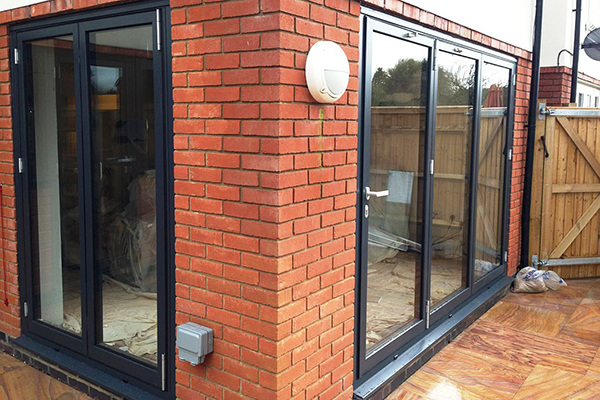 Home installation of a 2 panel bifold door and a 3 panel bifold door